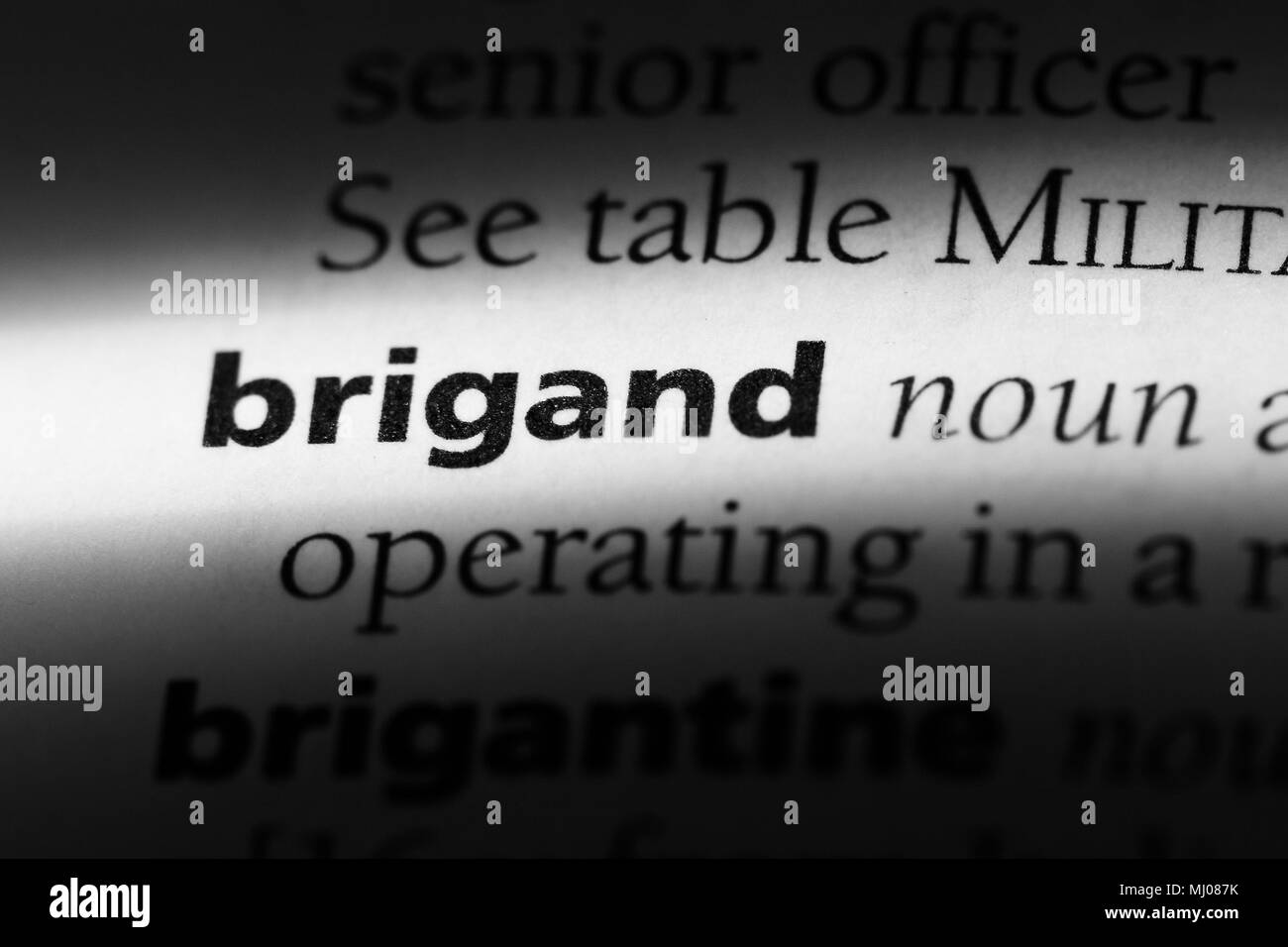 brigand word in a dictionary. brigand concept Stock Photo - Alamy