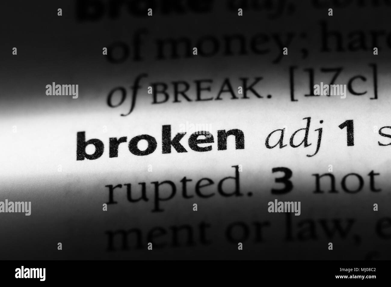 broken word in a dictionary. broken concept Stock Photo - Alamy