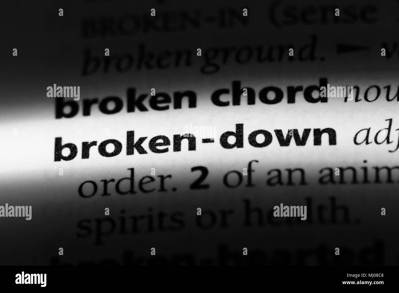 broken-down word in a dictionary. broken-down concept Stock Photo - Alamy