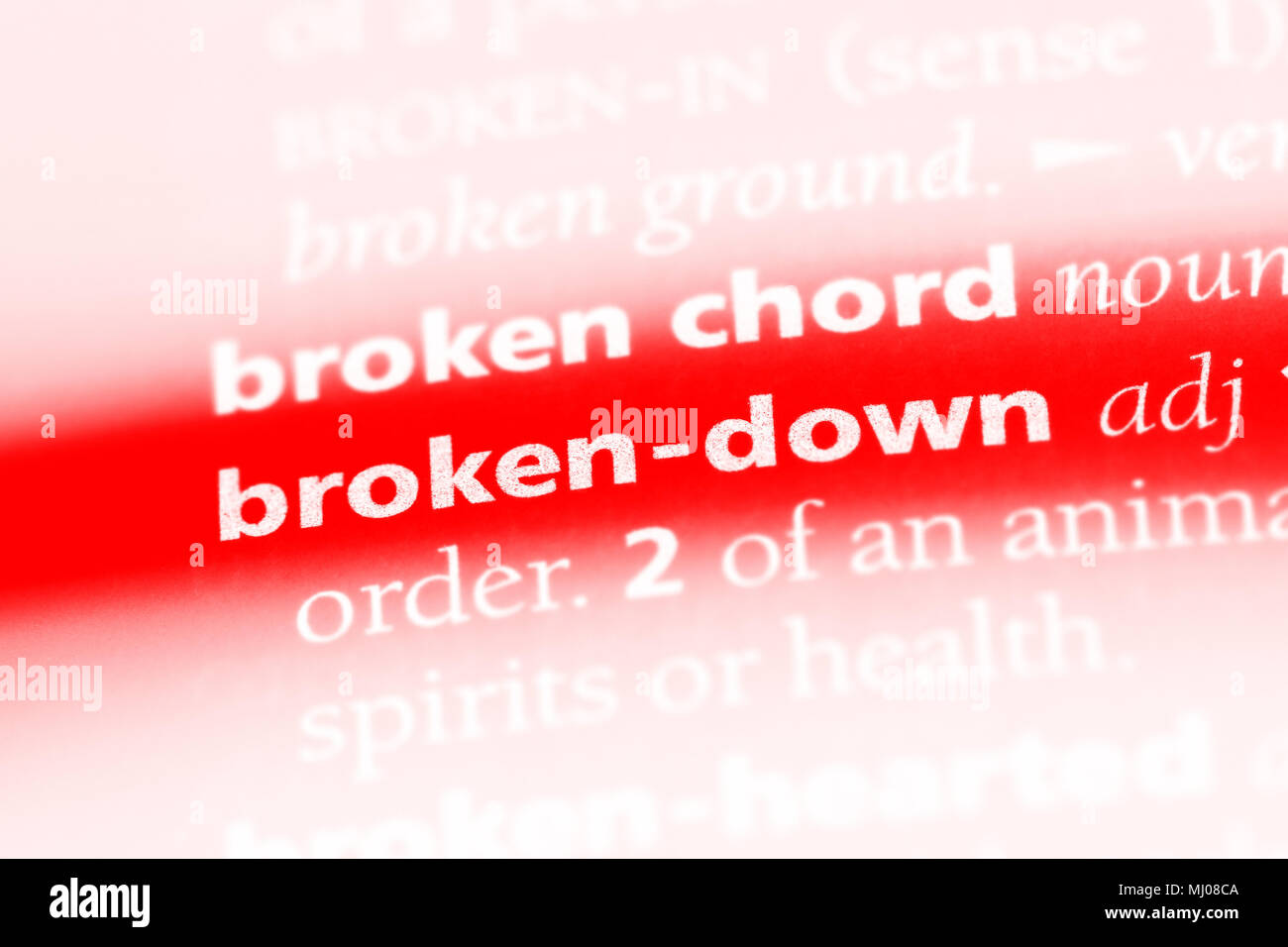 broken-down word in a dictionary. broken-down concept Stock Photo - Alamy