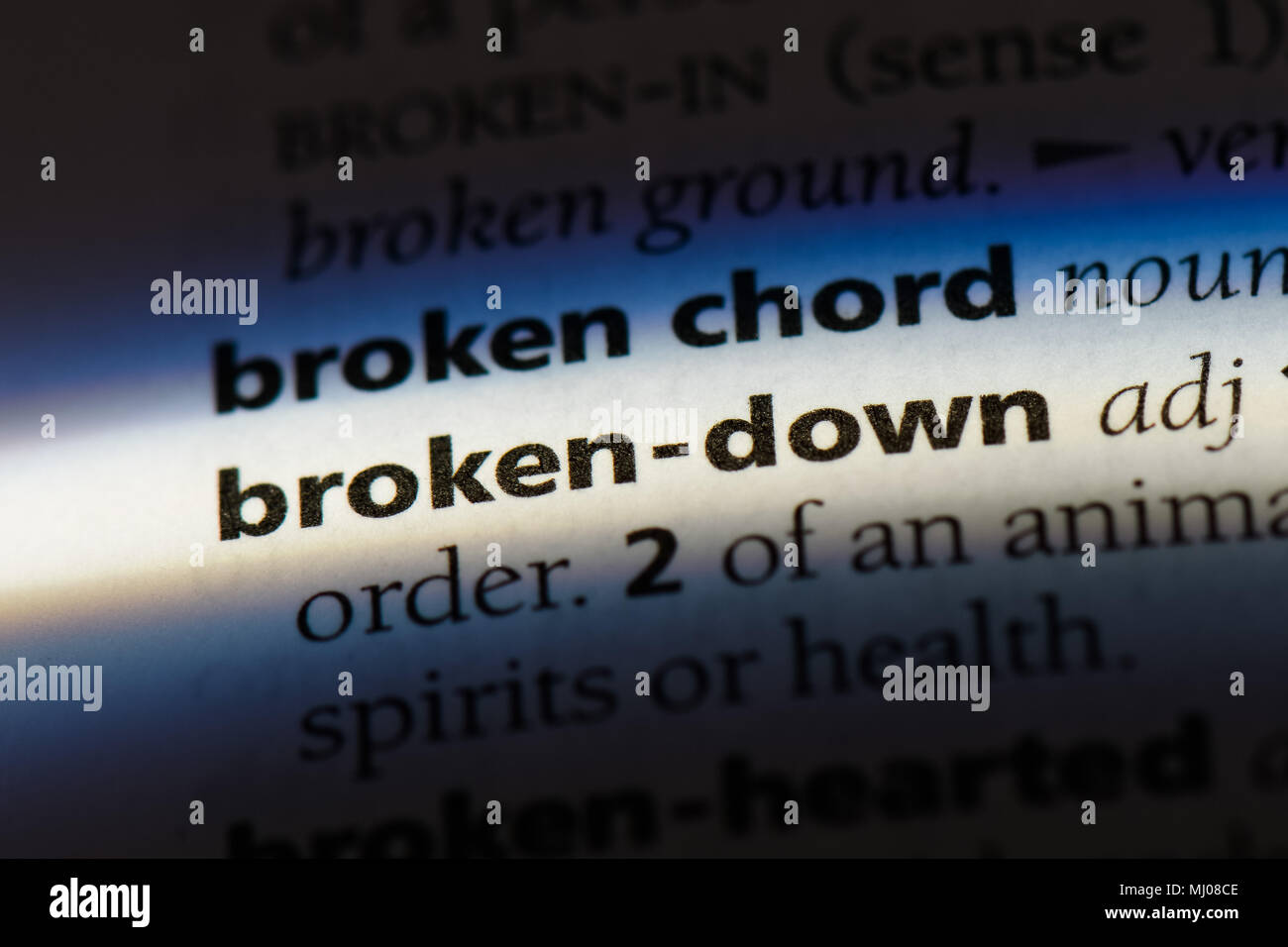 broken-down word in a dictionary. broken-down concept Stock Photo - Alamy