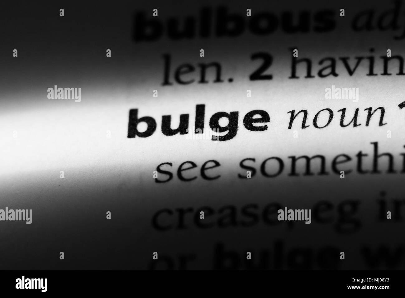 bulge word in a dictionary. bulge concept Stock Photo - Alamy