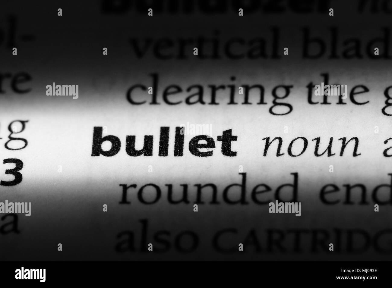 bullet word in a dictionary. bullet concept Stock Photo - Alamy