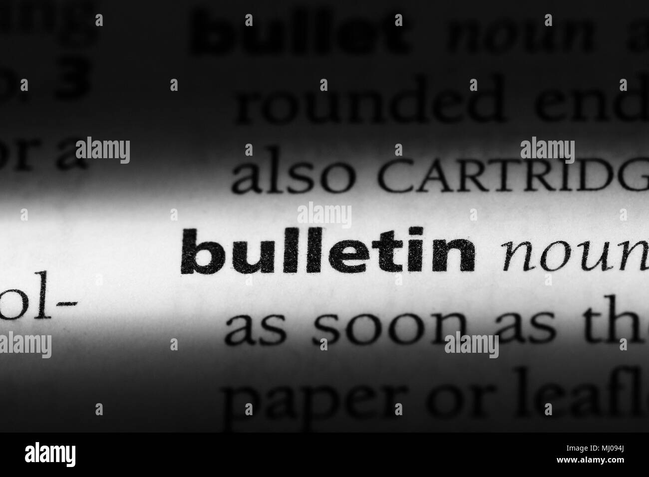 bulletin word in a dictionary. bulletin concept Stock Photo - Alamy