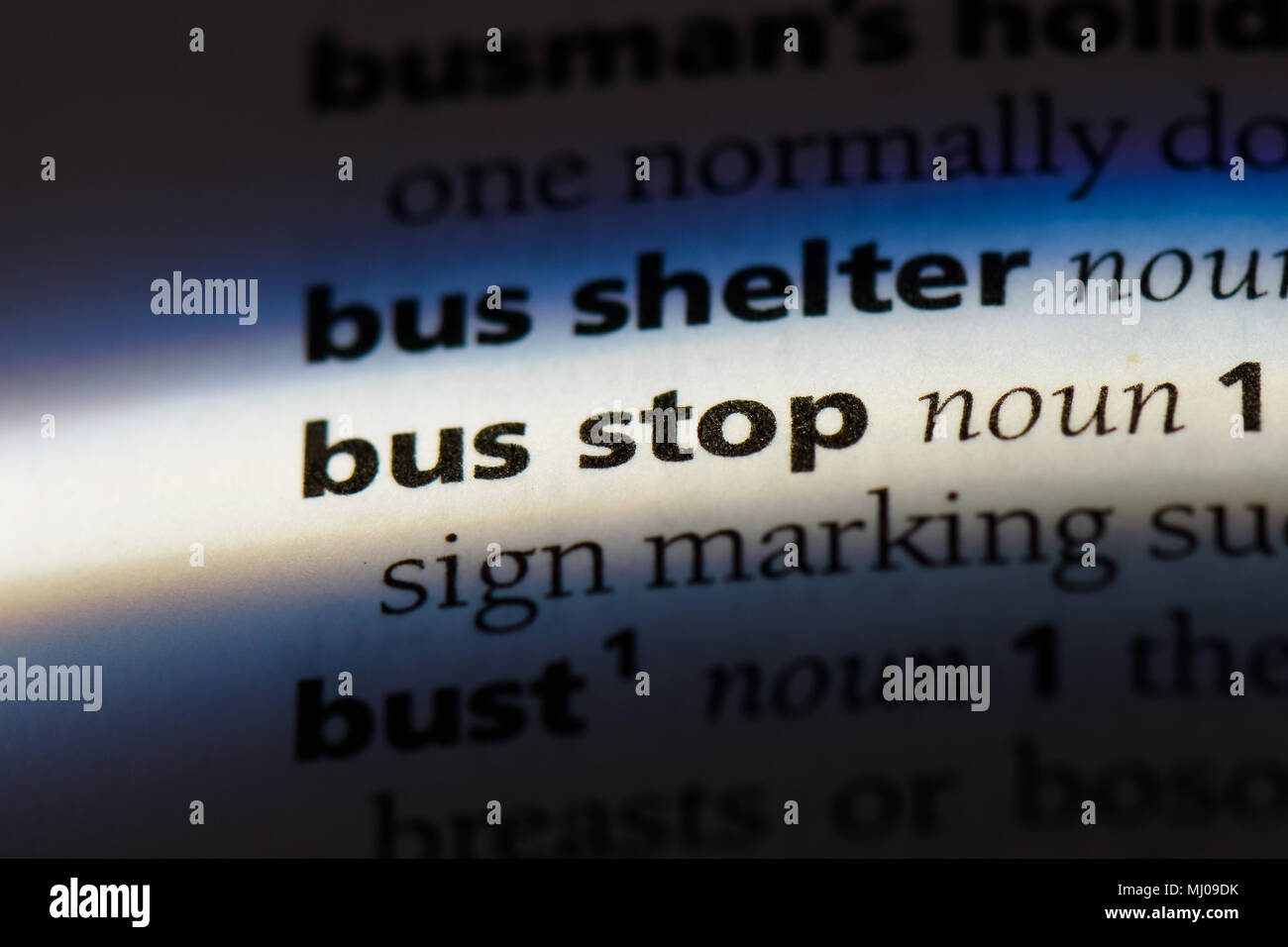 bus stop word in a dictionary. bus stop concept Stock Photo - Alamy