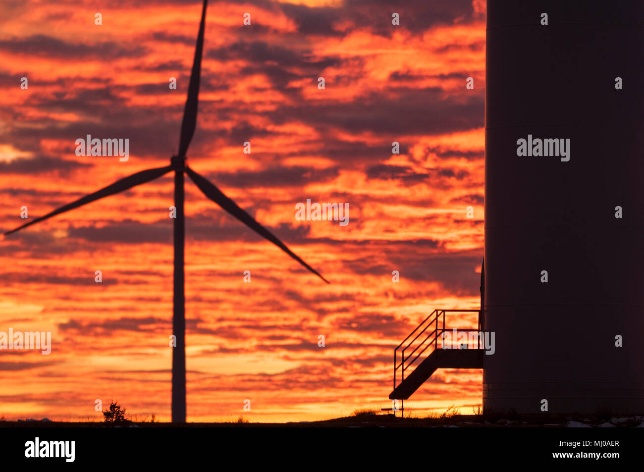 wind turbines at sunset, wind energy Stock Photo - Alamy