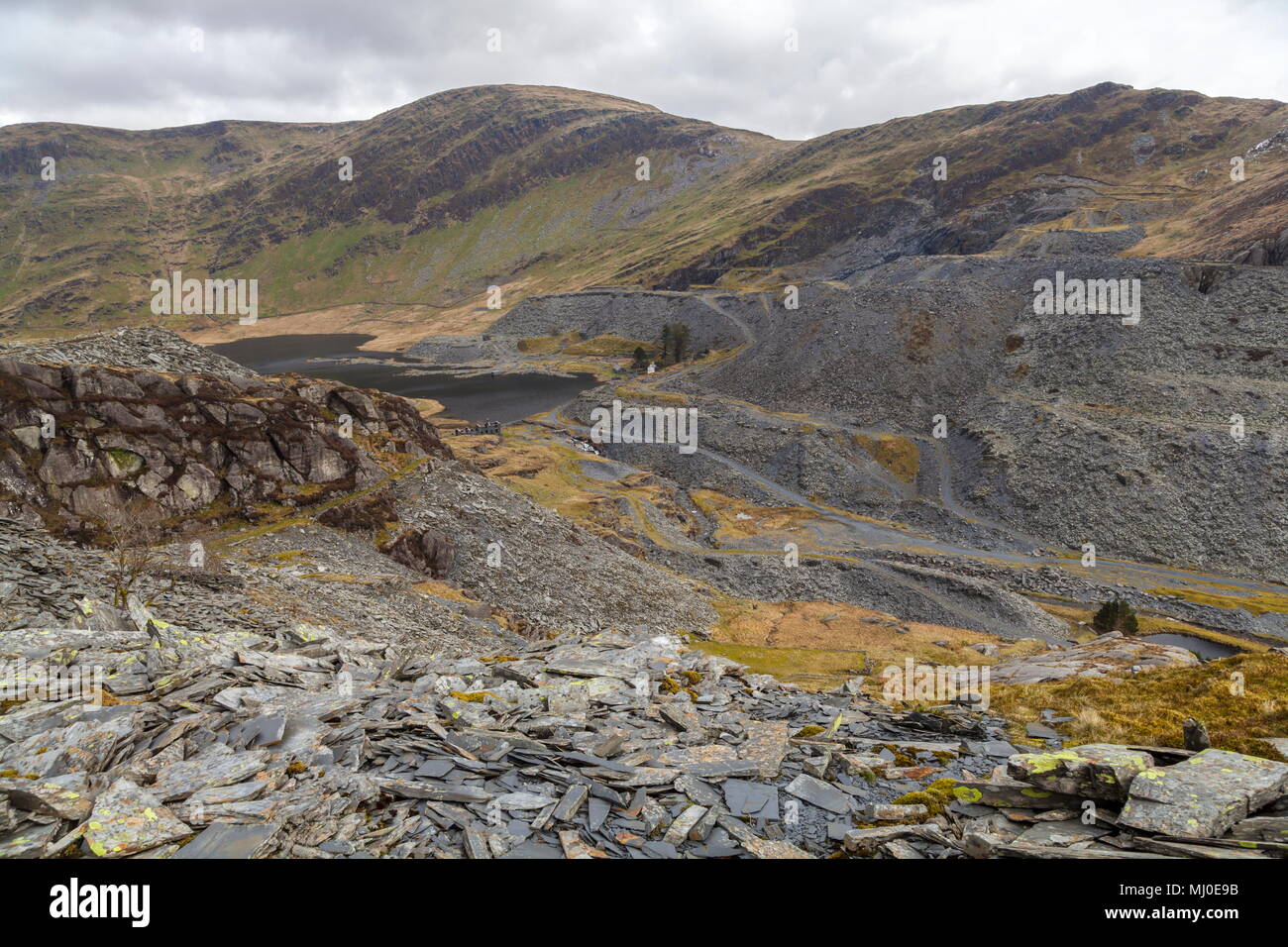 Lookijng down from the waste tips of the disused quarry of Wrysgan ...