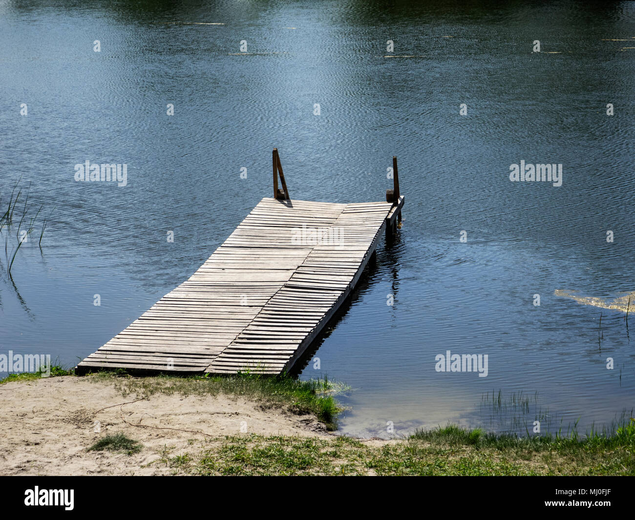 footbridge for swimming on the lake Stock Photo - Alamy