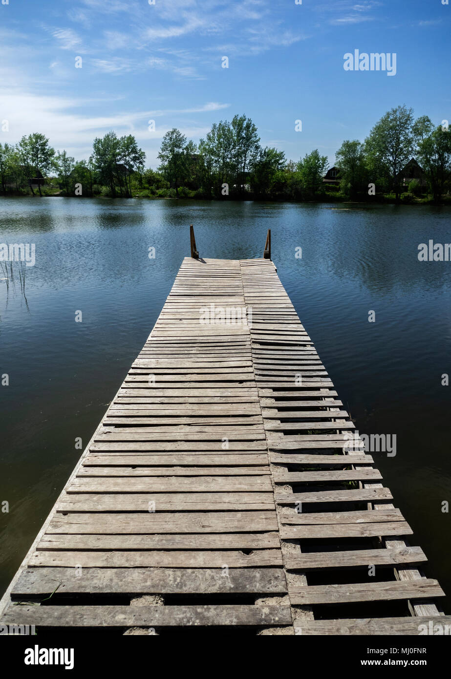 footbridge for swimming on the lake Stock Photo - Alamy