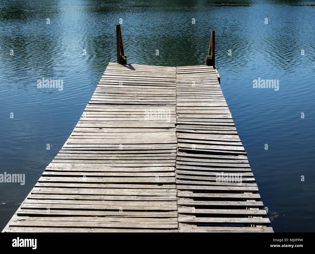 footbridge for swimming on the lake Stock Photo - Alamy