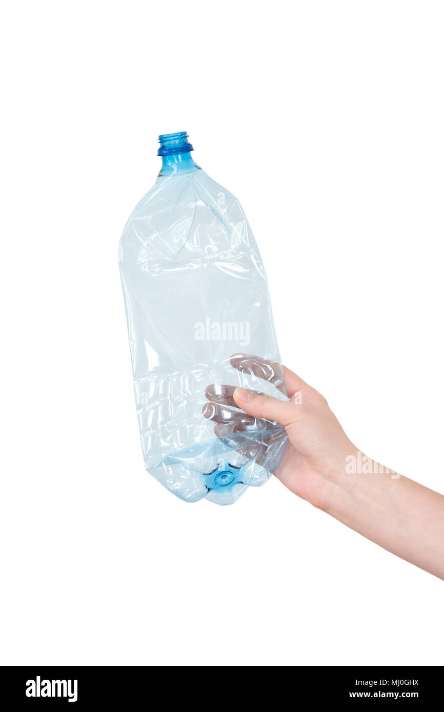 Empty plastic water bottle man hand Cut Out Stock Images & Pictures - Alamy