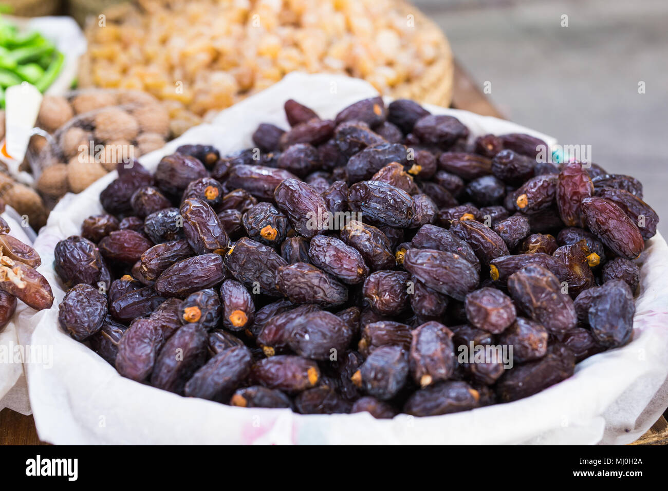 Fresh dates in a market - healthy lifestyle, food and fruit concept ...