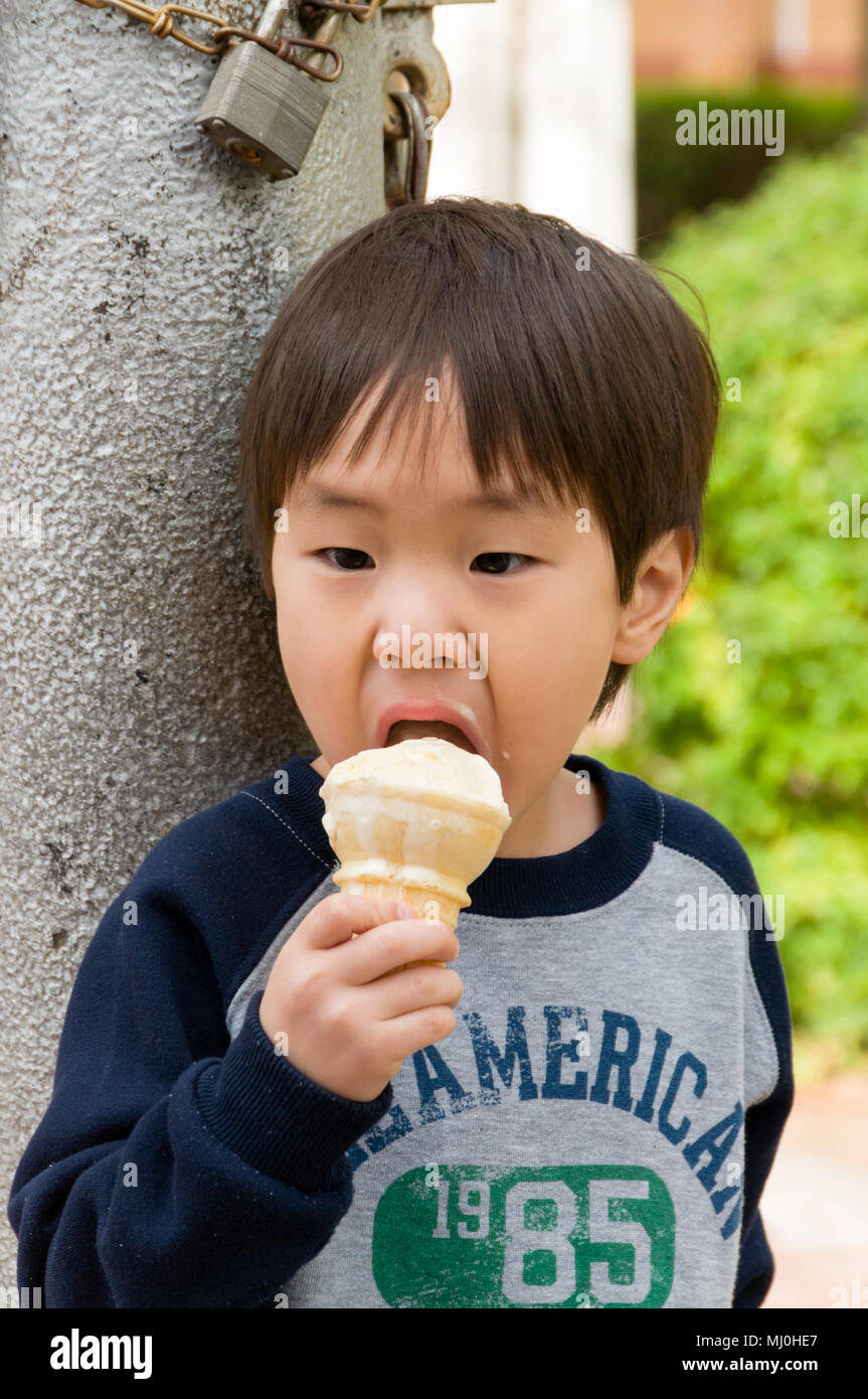 Young Boy with his Ice Cream Stock Photo - Alamy
