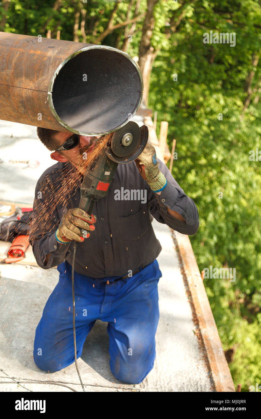 Cutting steel heavy industry by electric flex Stock Photo - Alamy