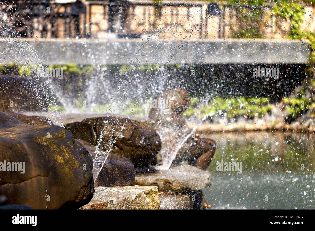Splashing water from a fountain. Stopping fluid movement Stock Photo ...