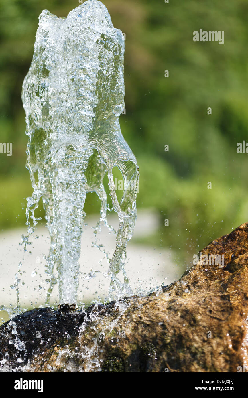 Splashing water from a fountain. Stopping fluid movement Stock Photo ...