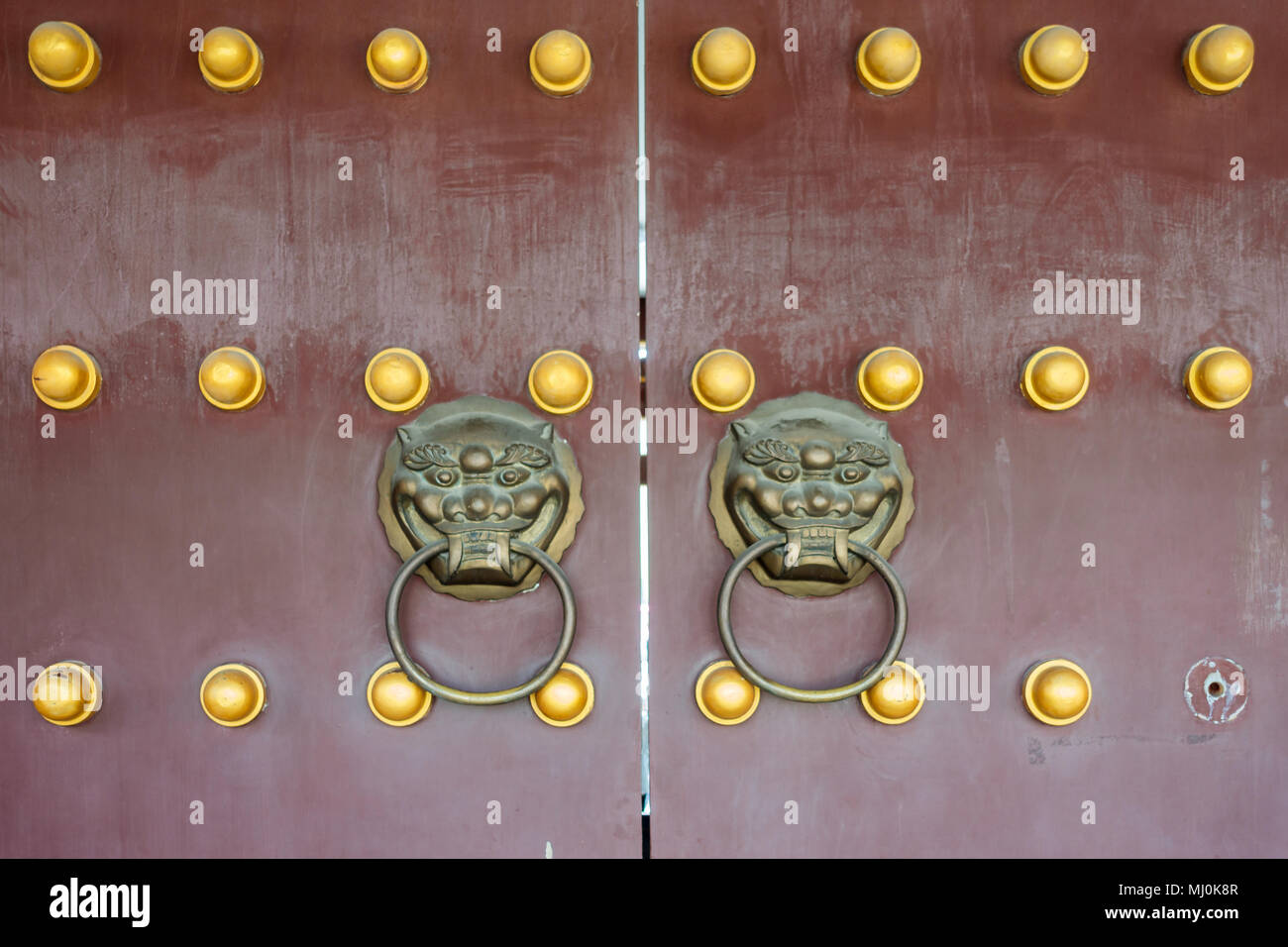 Chinese Traditional Gate with Lion Knockers on it Stock Photo - Alamy
