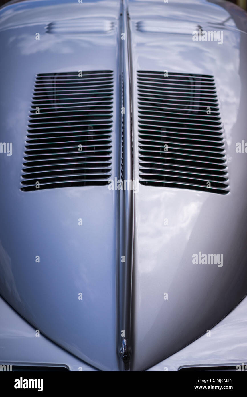 A close up look at an old classic grey car. Retro automobile exterior ...