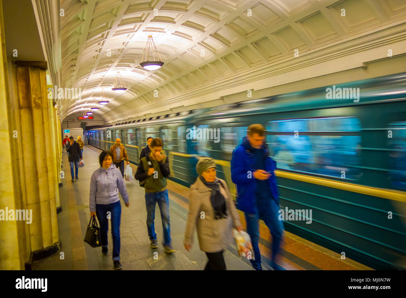MOSCOW, RUSSIA- APRIL, 24, 2018: Blurred people walking in underground ...