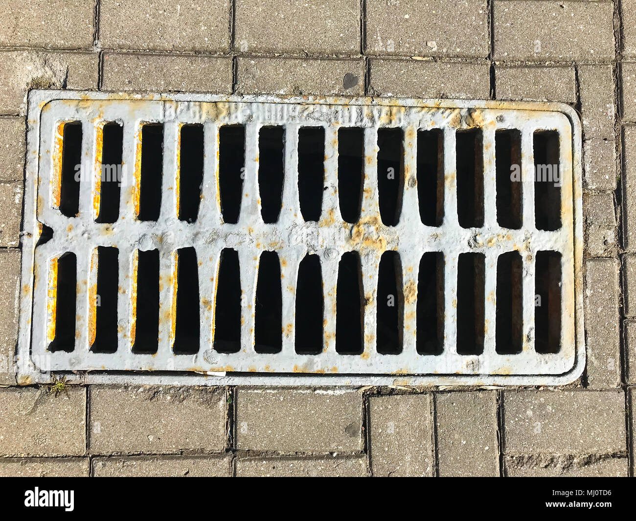 Steel grill for road drain hi-res stock photography and images - Alamy