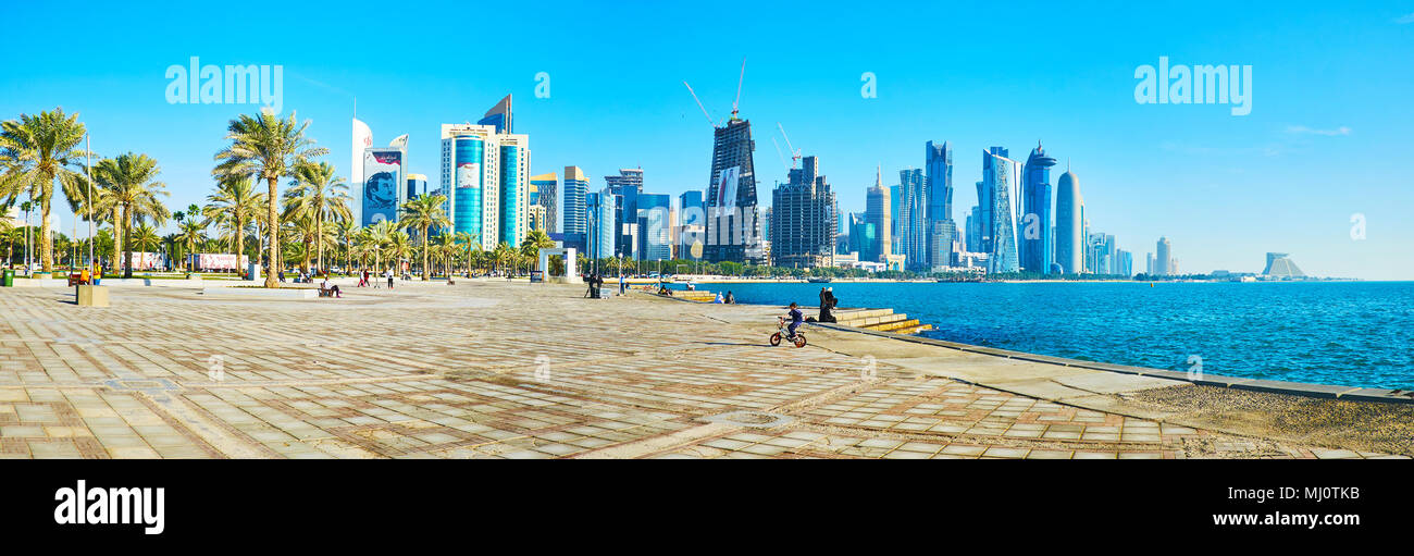 DOHA, QATAR - FEBRUARY 13, 2018: Panorama of Corniche promenade with ...