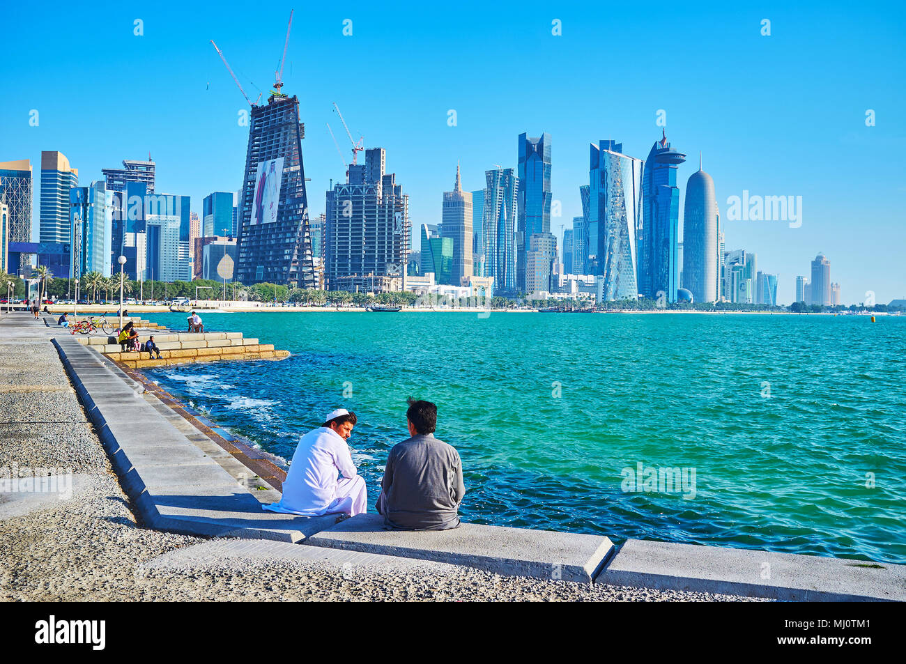 DOHA, QATAR - FEBRUARY 13, 2018: The steps on the coast of Persian Gulf ...