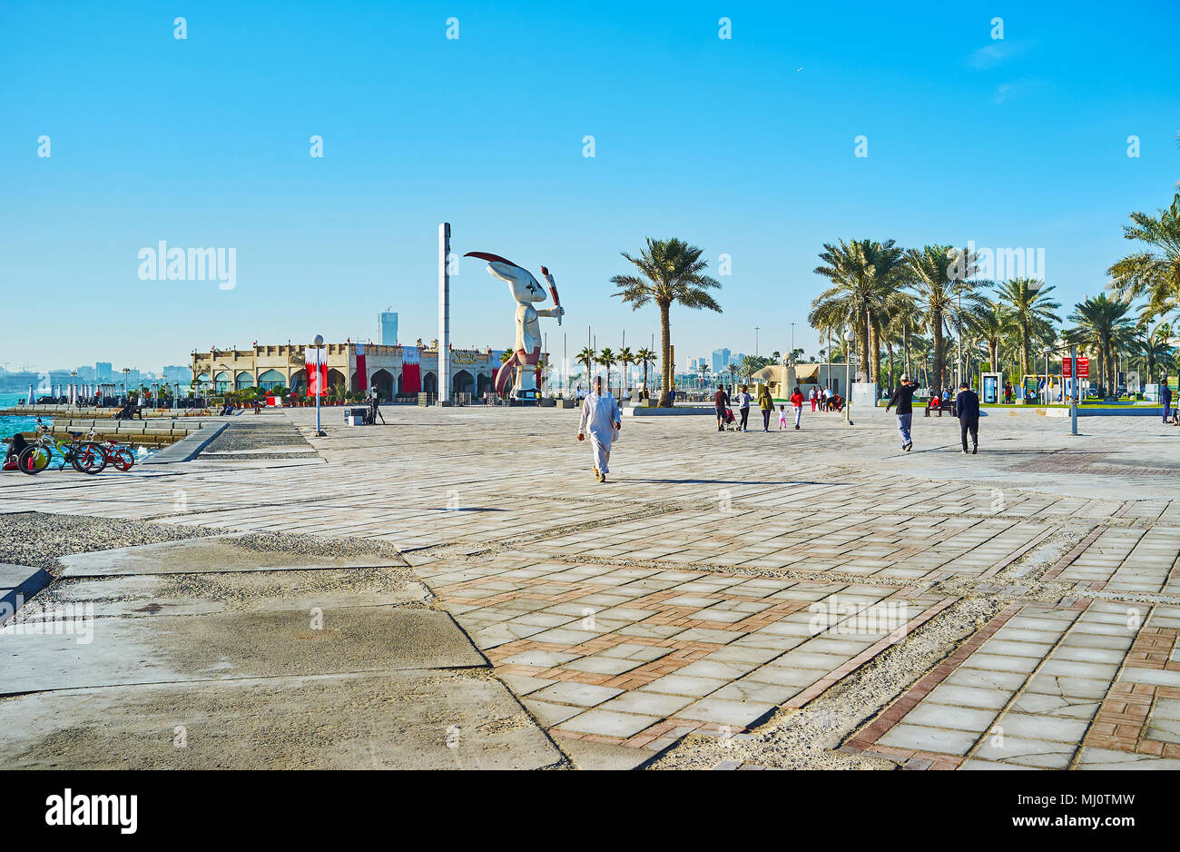 DOHA, QATAR - FEBRUARY 13, 2018: Seaside Corniche promenade with a view ...