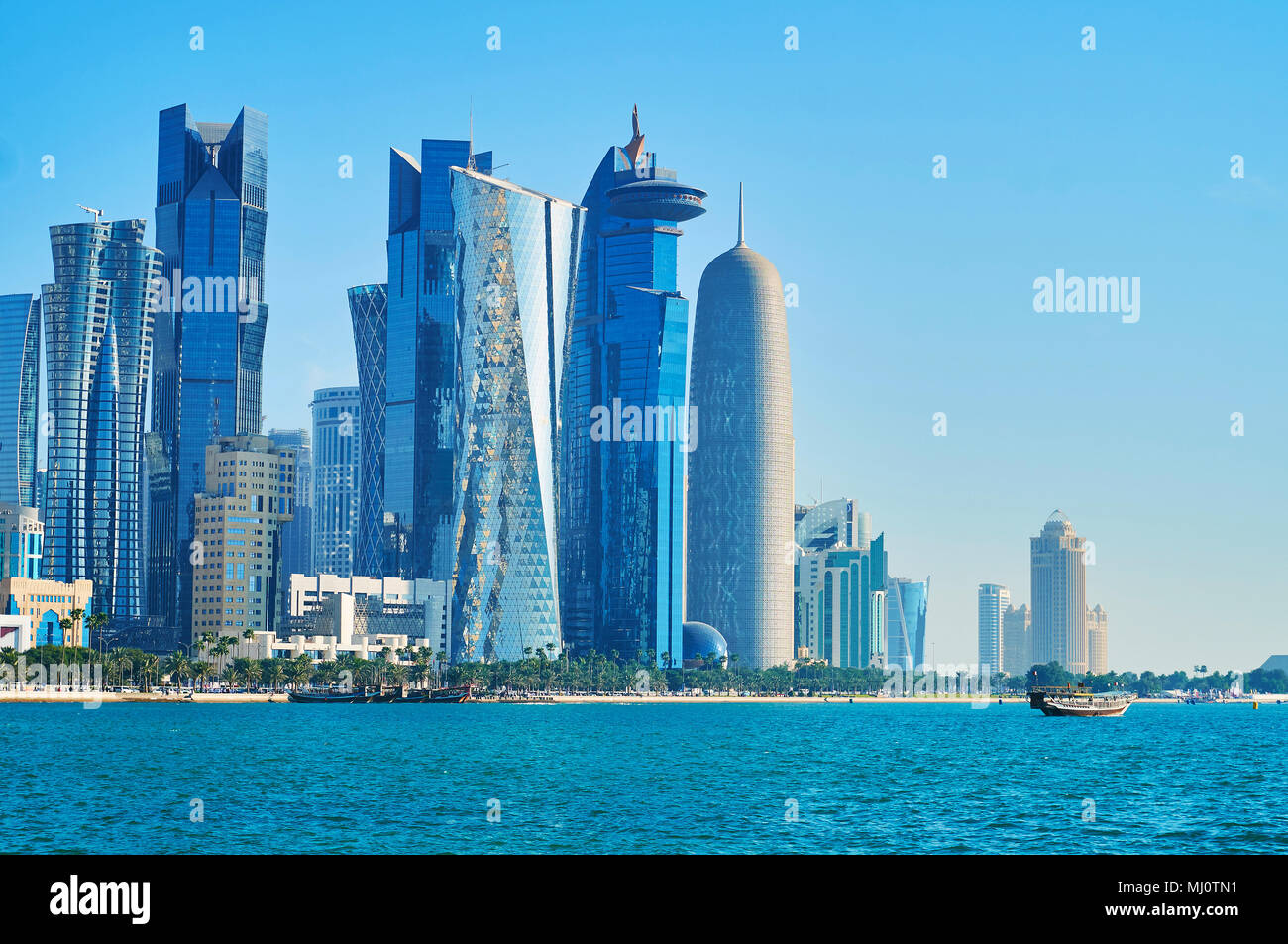 The glass walls of Al Dafna district skyscrapers, located at the West ...