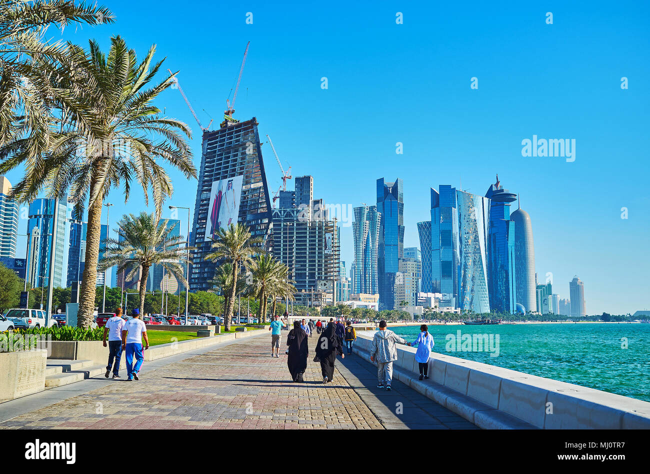 DOHA, QATAR - FEBRUARY 13, 2018: The pleasant walk along the modern ...
