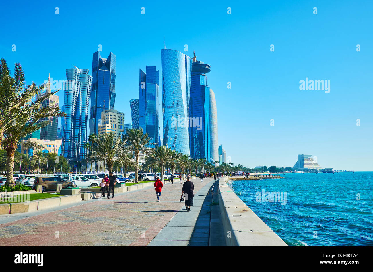 DOHA, QATAR - FEBRUARY 13, 2018: The Corniche promenade stretches along ...