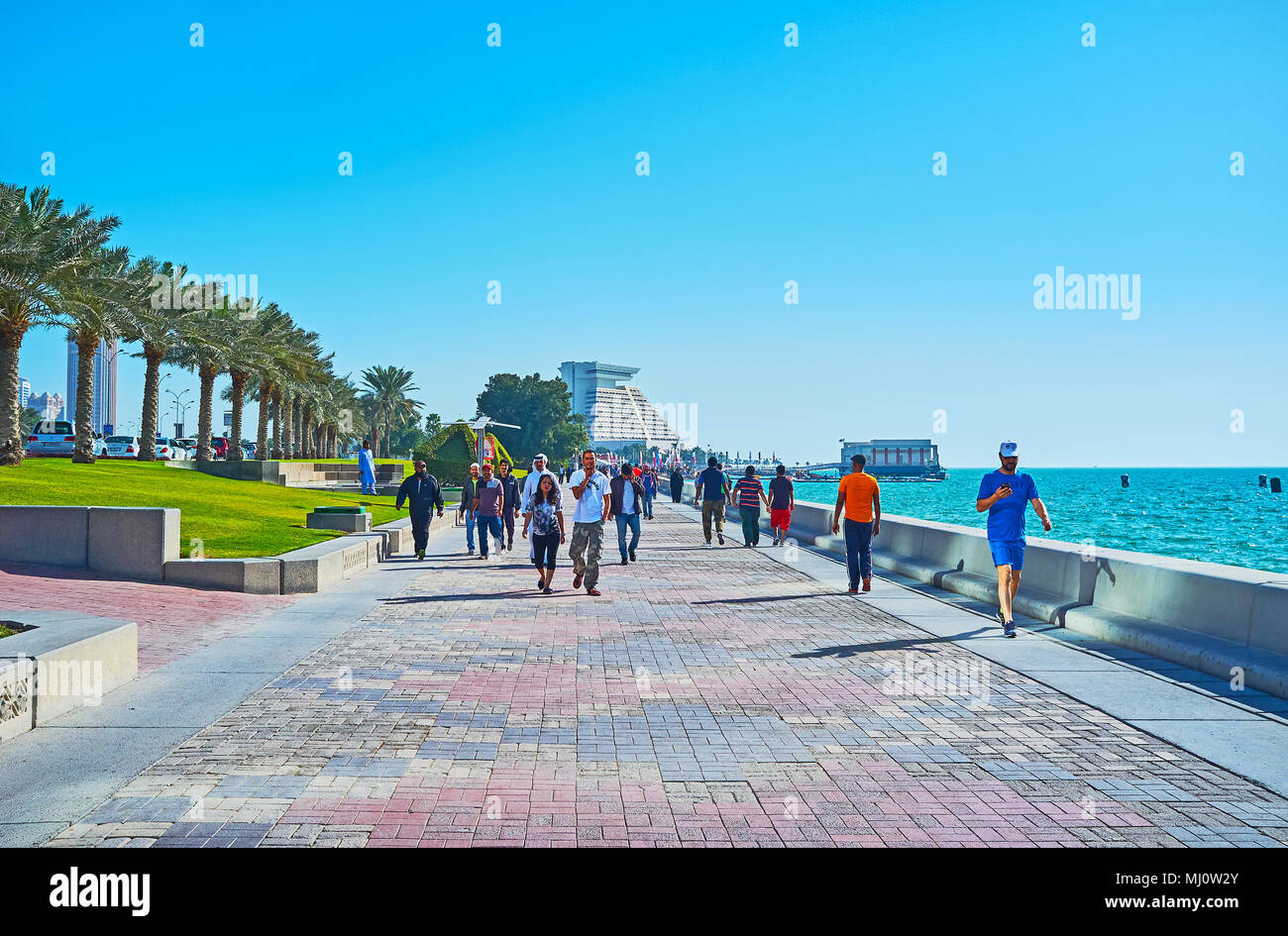DOHA, QATAR - FEBRUARY 13, 2018: The crowded Al Corniche promenade in ...