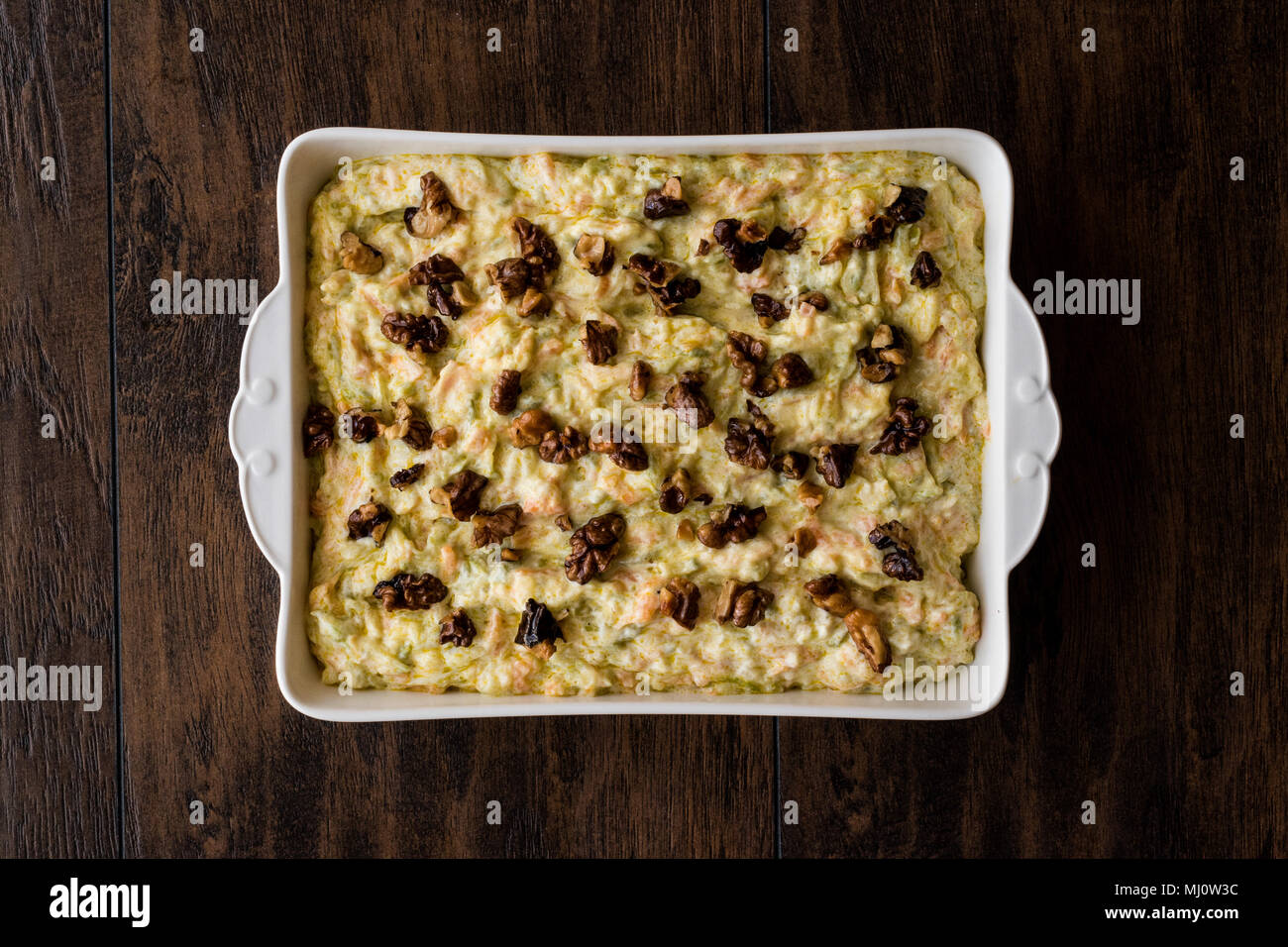 Turkish Carrot Salad with Walnut / Havuc salatasi on a wooden surface ...