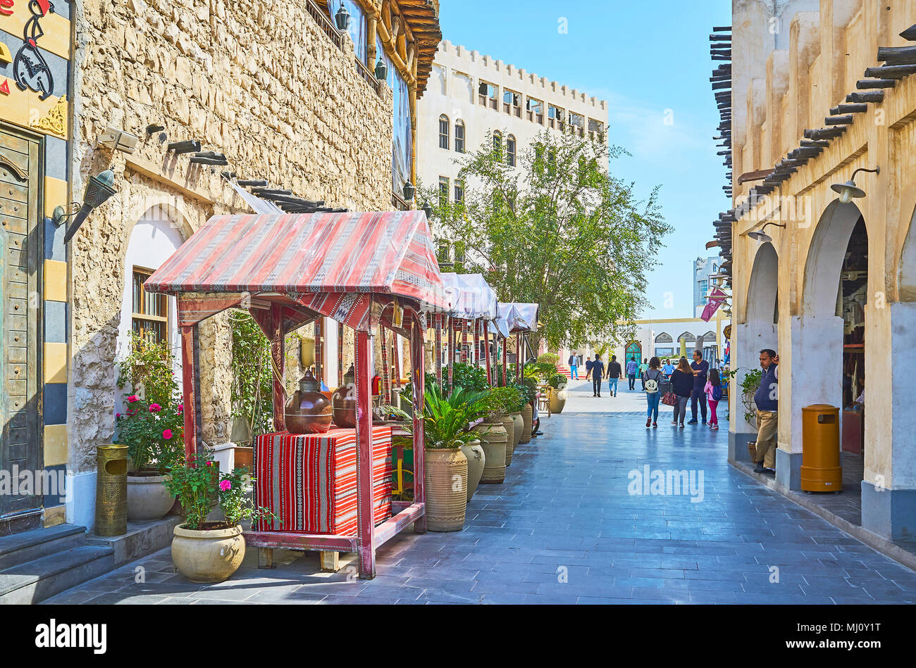 DOHA, QATAR - FEBRUARY 13, 2018: The deserted climate makes green ...