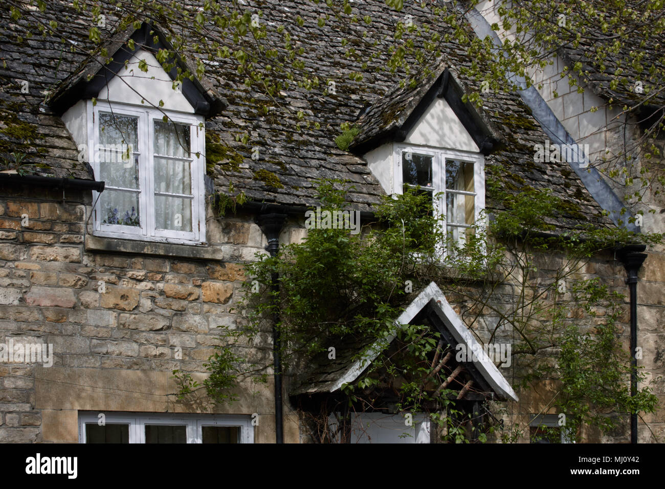 Gables and windows of a Cotswold cottage, Winchcombe, Gloucestershire ...