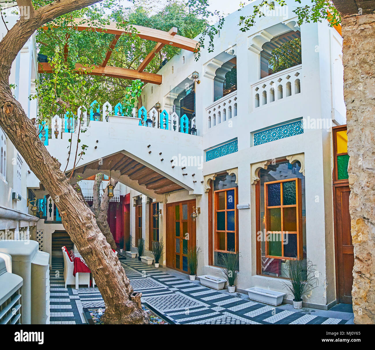 DOHA, QATAR - FEBRUARY 13, 2018: The cozy courtyard of the luxury ...
