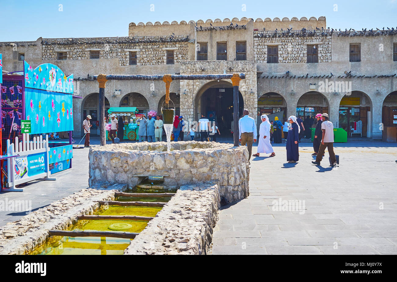 DOHA, QATAR - FEBRUARY 13, 2018: The fountain in shape of traditional ...
