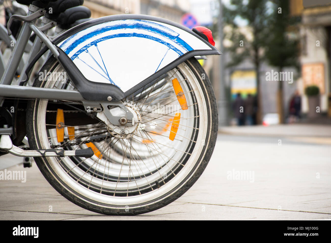 Healthy, ecological transport concept. Rental bikes parking lot. Row ...