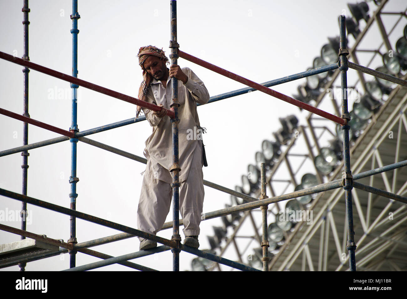 Old Man on Scaffolding Stock Photo - Alamy
