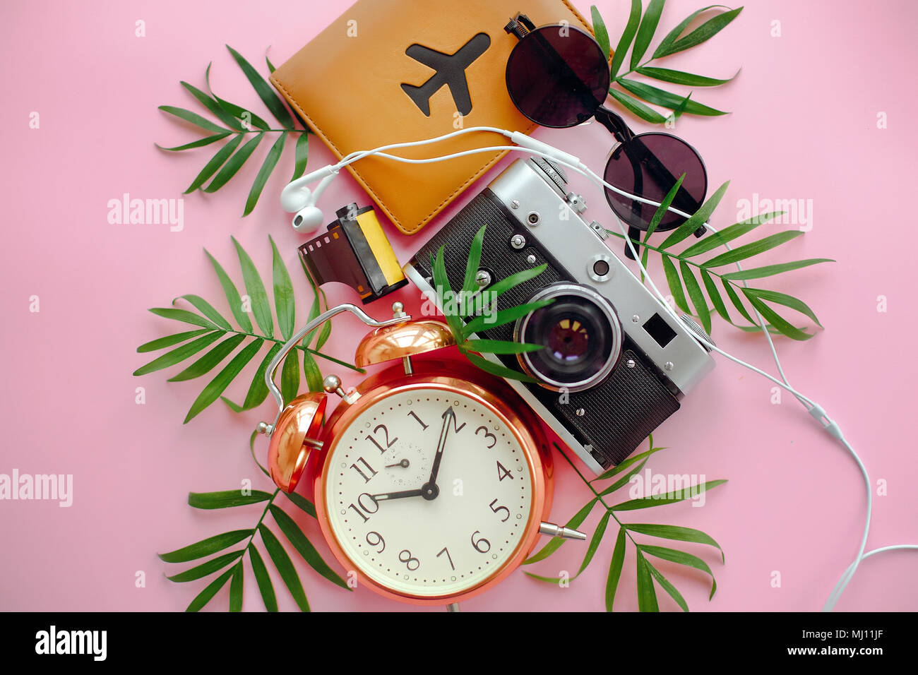 time to travel concept. passport with plane, sunglasses,photo camera ...
