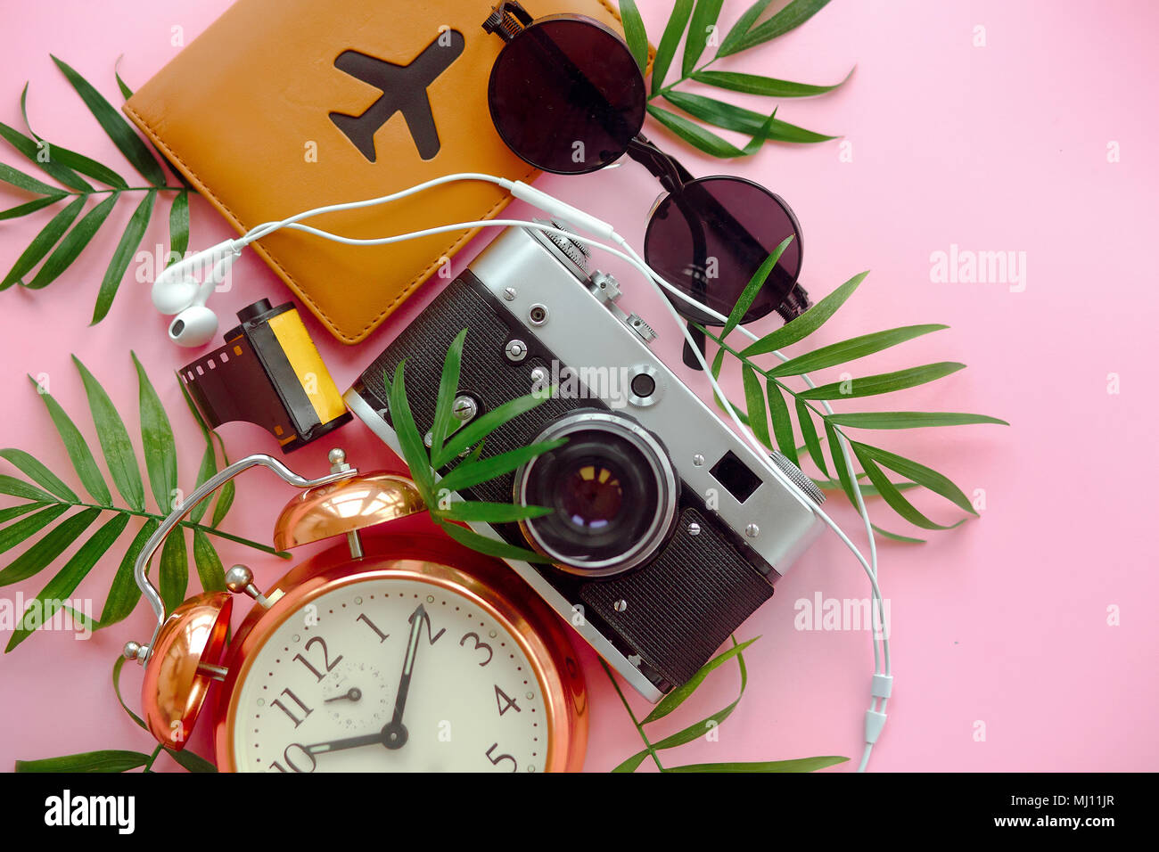 time to travel concept. passport with plane, sunglasses,photo camera ...
