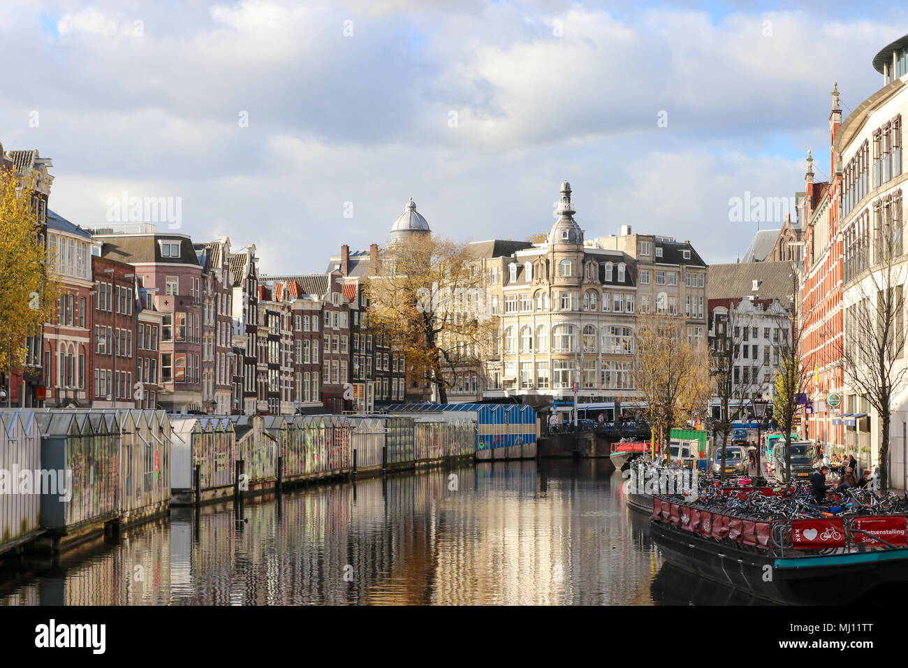 View of famous Bloemenmarkt (a floating flower market) and the Singel ...