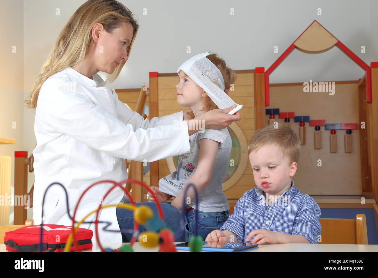 Child first aid nursery hi-res stock photography and images - Alamy