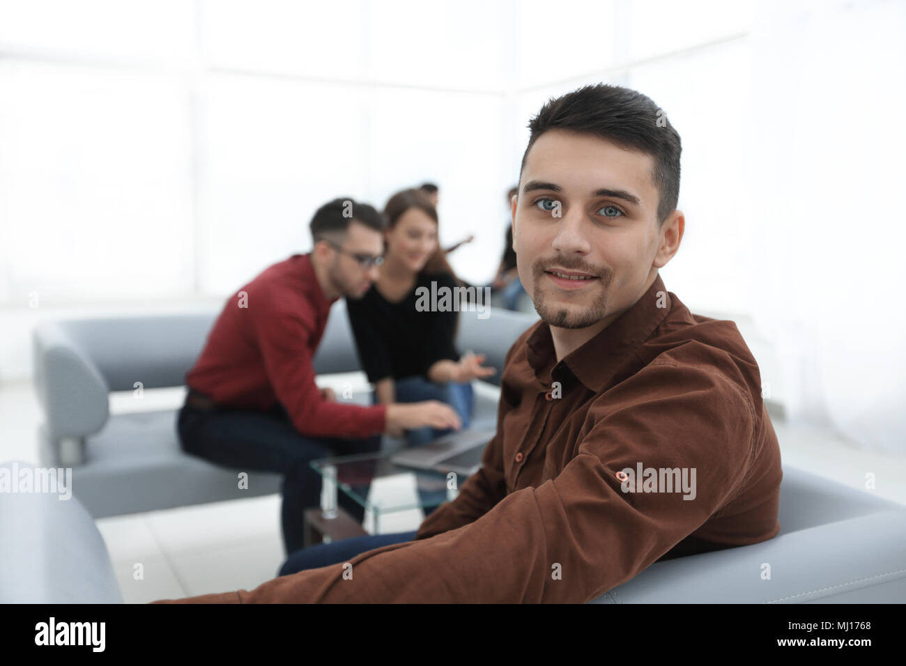 employee on the background of business team Stock Photo - Alamy