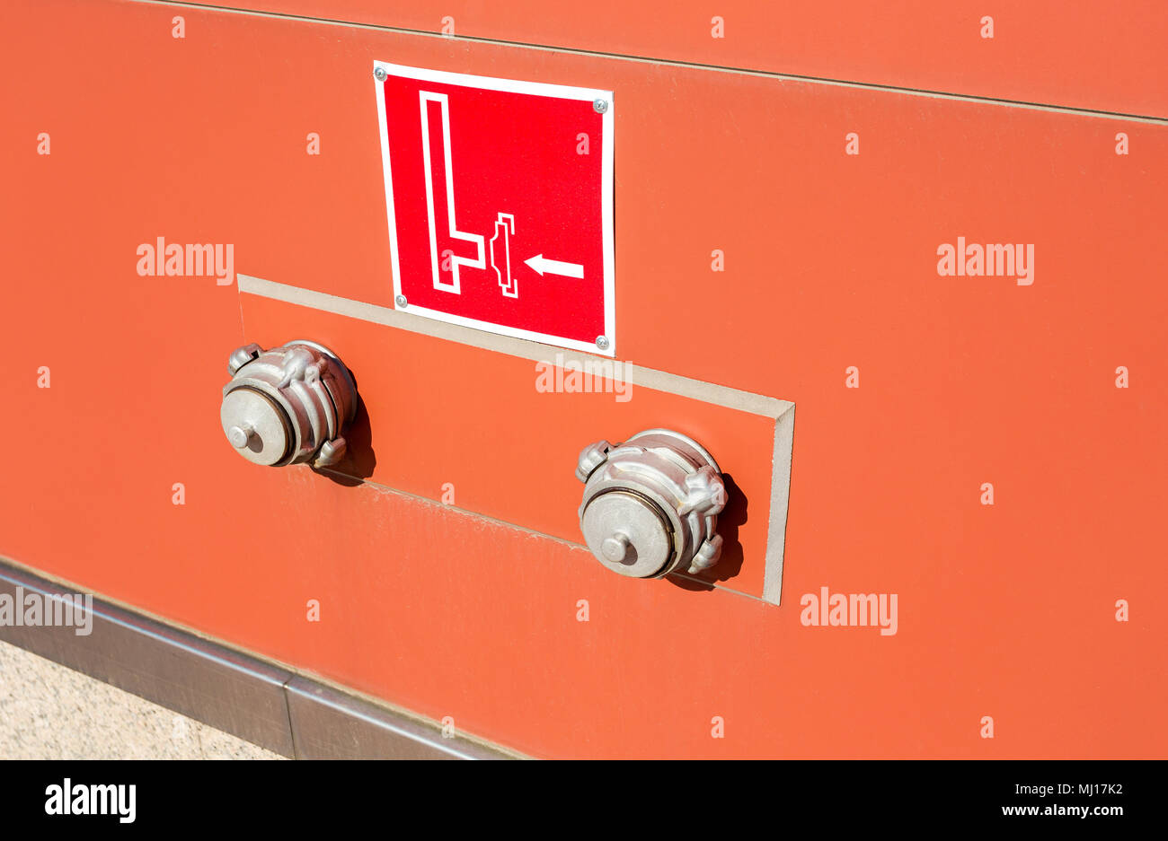 Water valve tank of FDC (Fire Department Connection) and warning sign ...