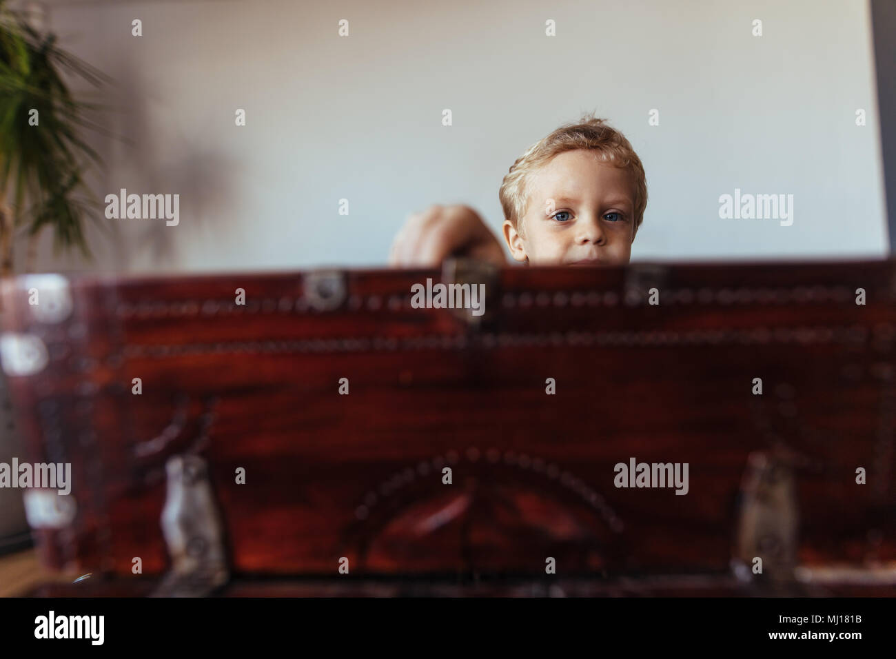 Boy opening box hi-res stock photography and images - Alamy
