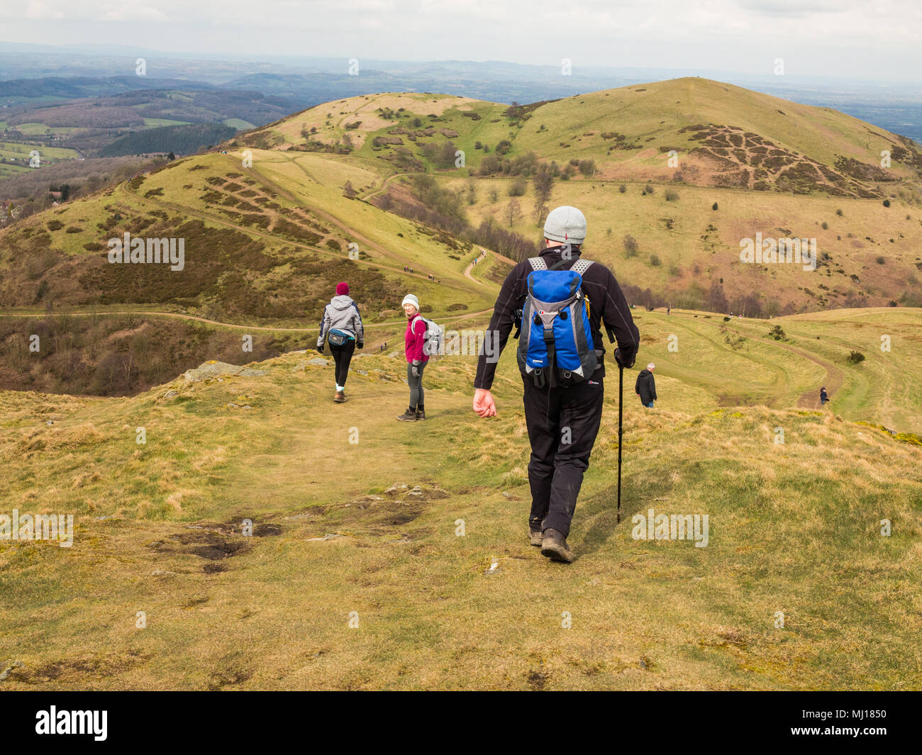 Men and women walking and rambling over the Malvern Hills in ...