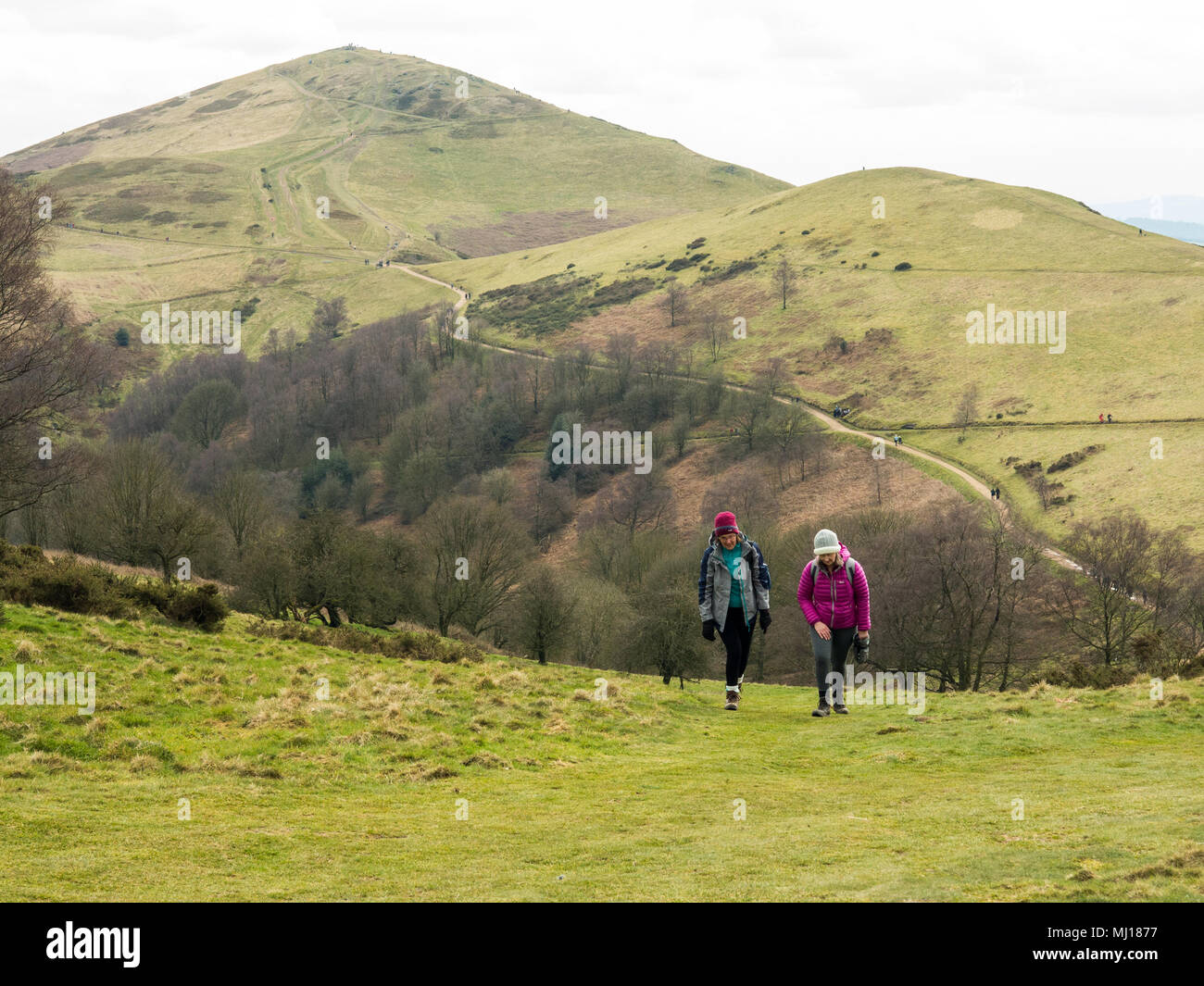 Men and women walking and rambling over the Malvern Hills in ...