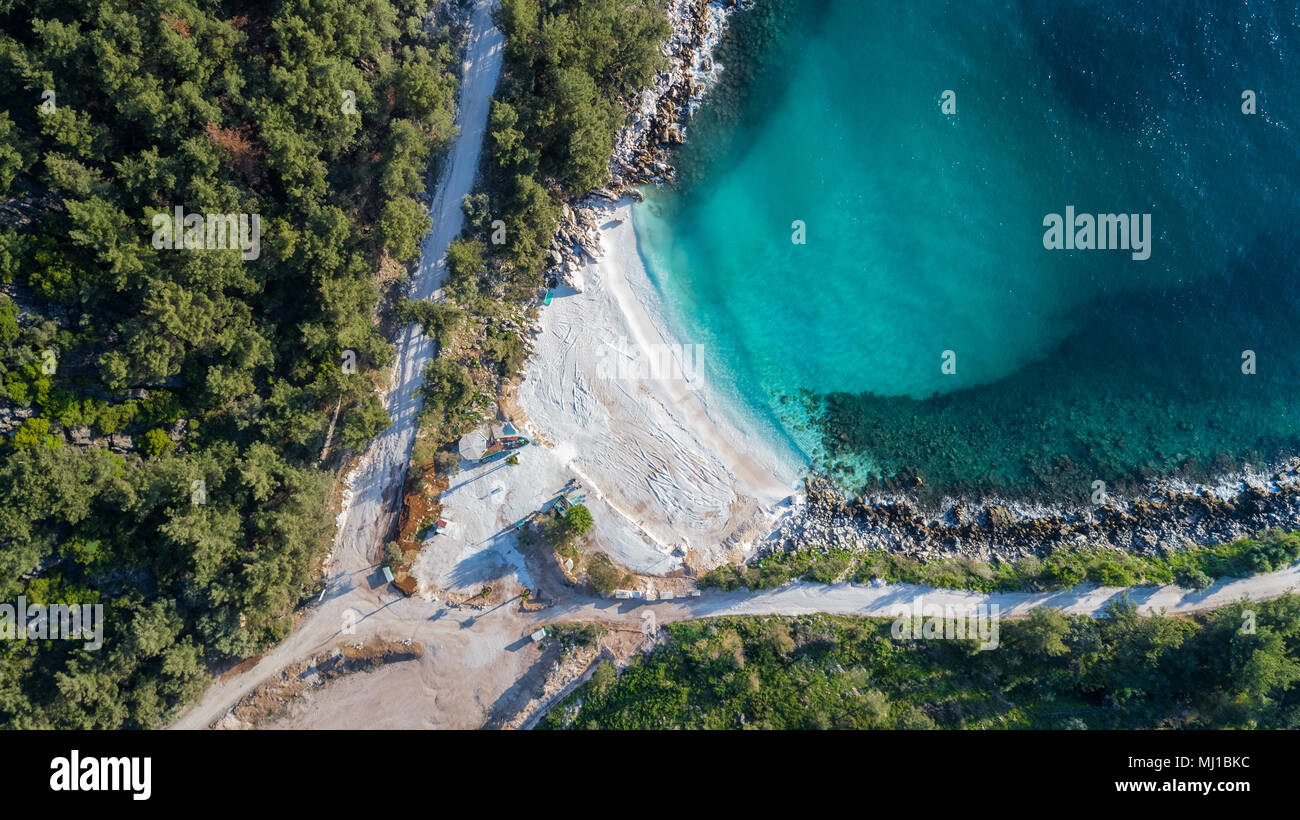 Aerial view of Marble beach. The most beautiful white beach in Greece ...