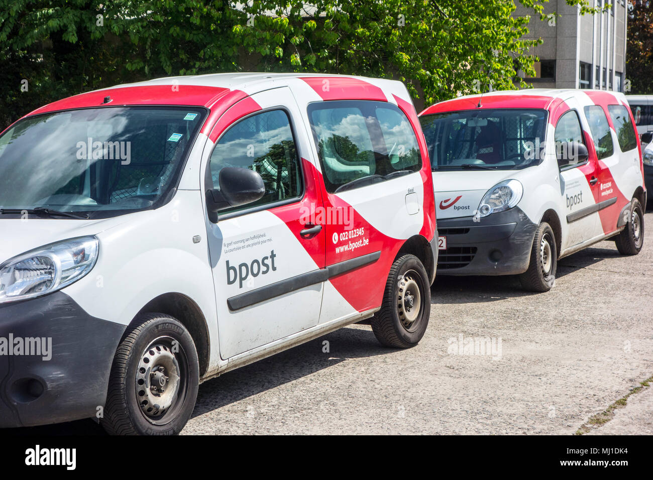 Red-white post delivery cars from Bpost, Belgian company responsible ...