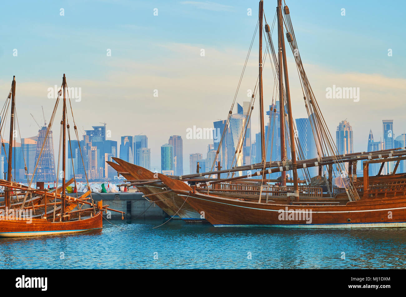 The numerous skyscrapers of Al Dafna district, covered with sunrise ...